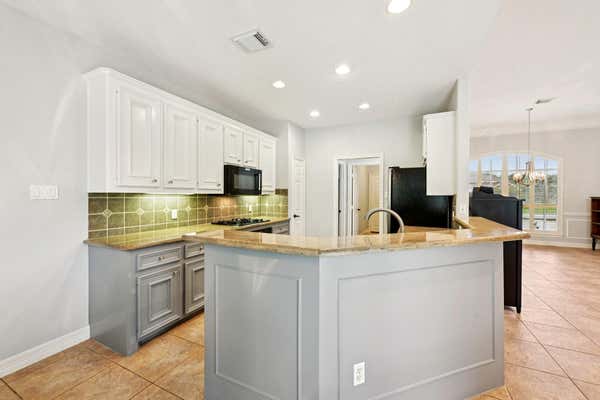 7187 EDGEWATER DR, WILLIS, TX 77318 | REMAX