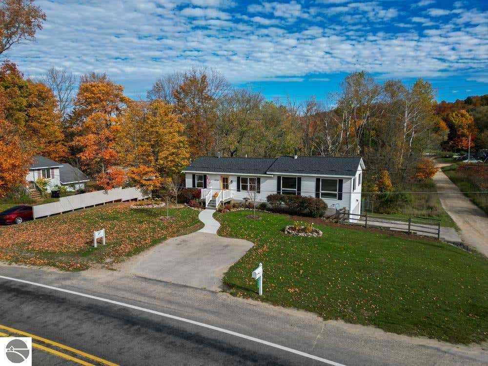 8335 S MAPLE CITY RD, MAPLE CITY, MI 49664 | RE/MAX